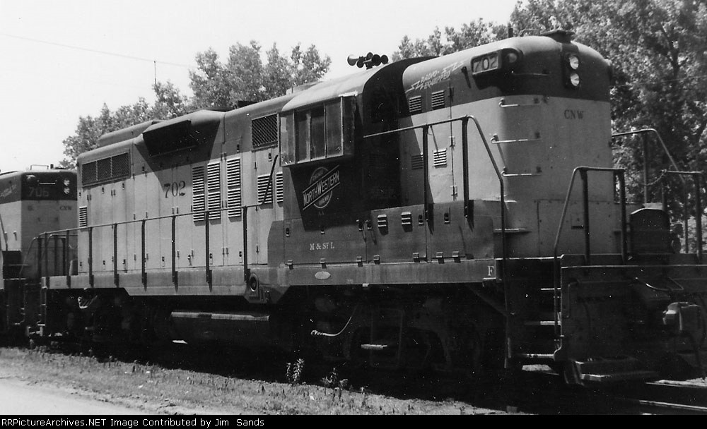 CNW 702 in 1965 at Cedar Lake Yards